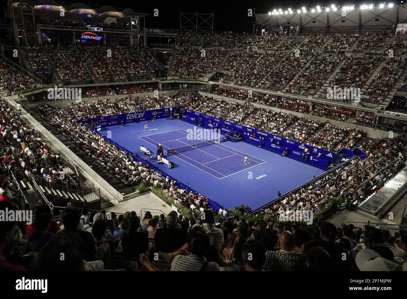 Tommy Paul of the United States, right, returns the ball to Taylor ...