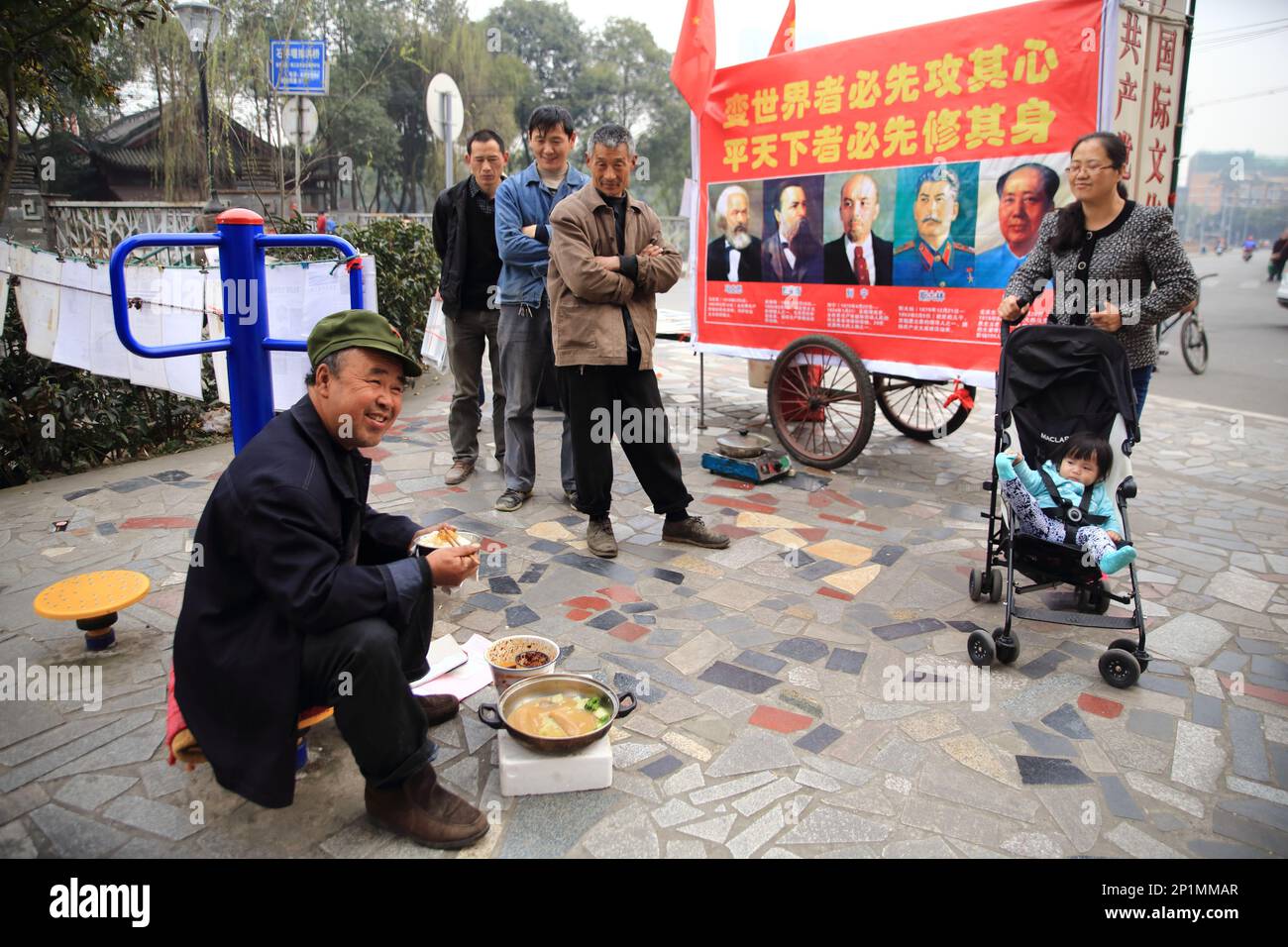 60-year-old Liu Guangjian (L), from Pengzhou city of Sichuan province ...