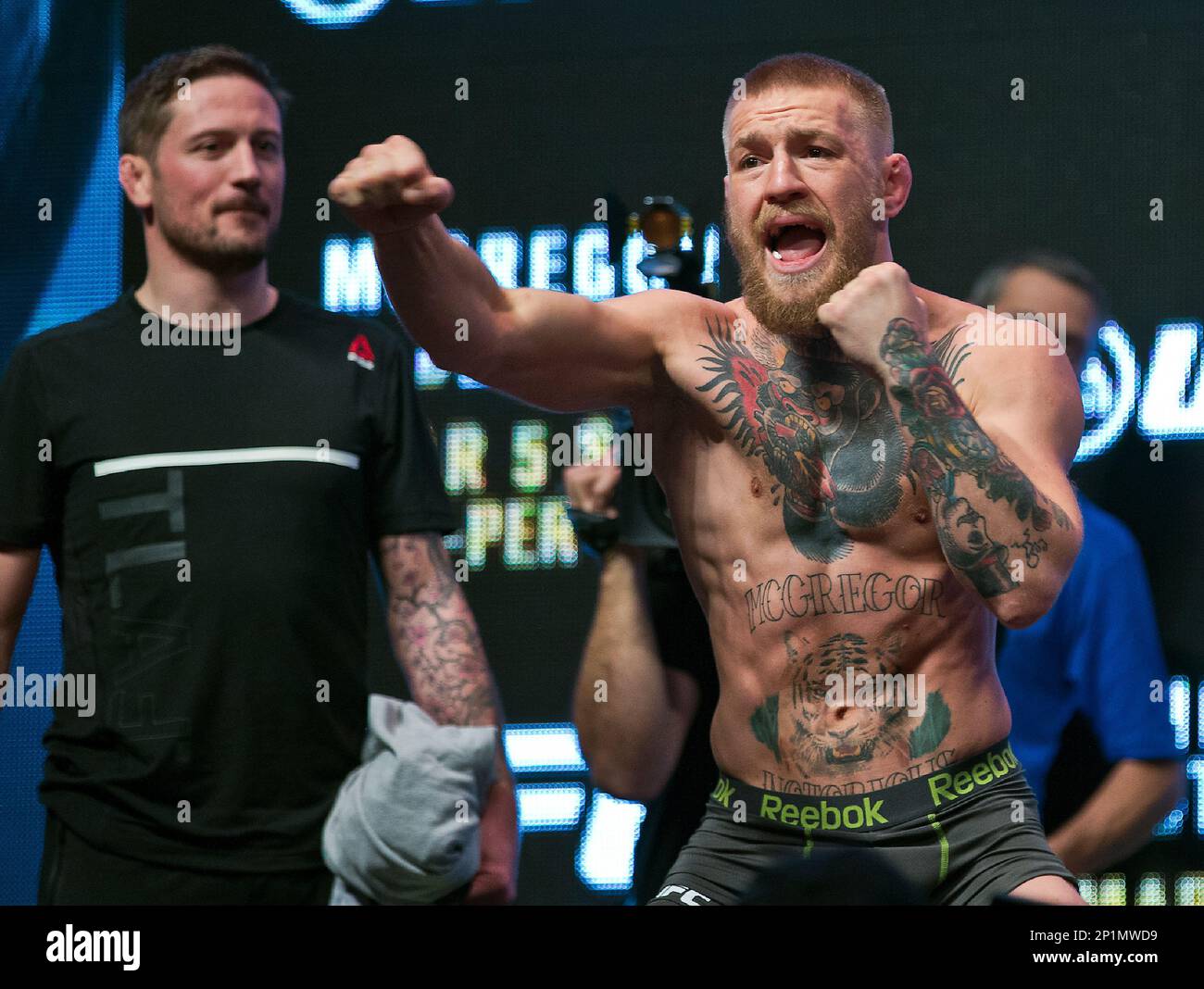 UFC welterweight Conor McGregor shadow boxes for the fans during the ...