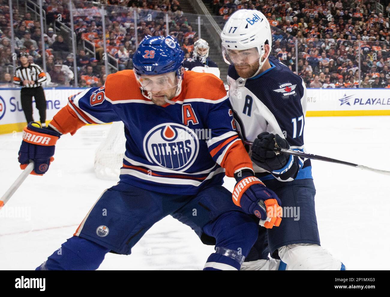 Winnipeg Jets' Adam Lowry (17) and Edmonton Oilers' Leon Draisaitl (29 ...