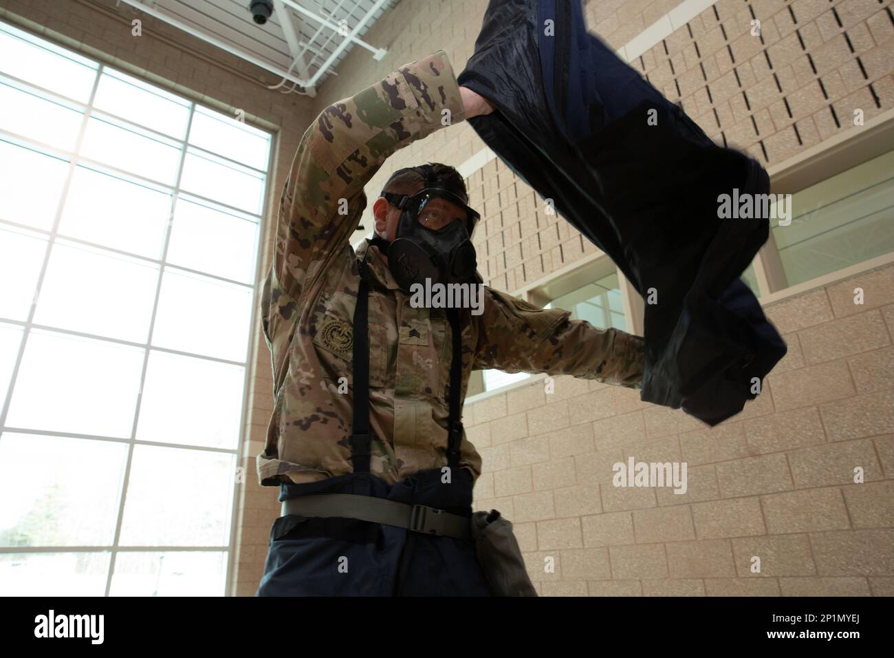 Sgt. Andrew Paradis, a heavy equipment operator in the 210th Engineer ...