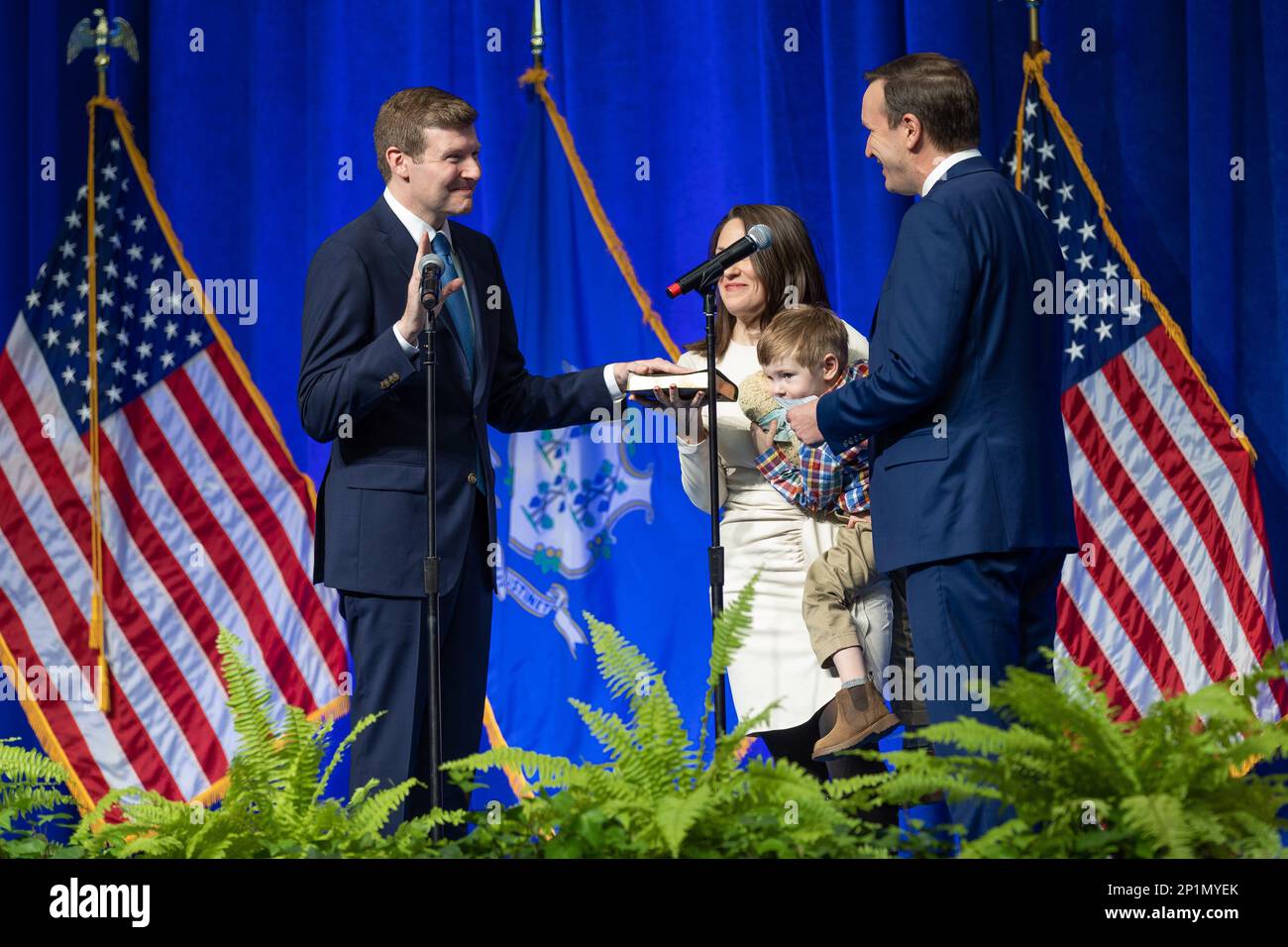 Connecticut State Comptroller Sean Scanlon, left, stands alongside his ...