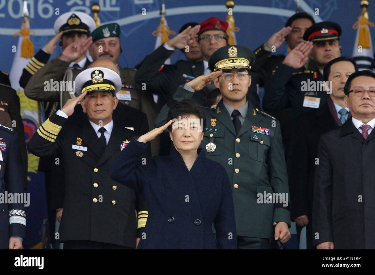 South Korean President Park Geun-hye, center, salutes during a military ...