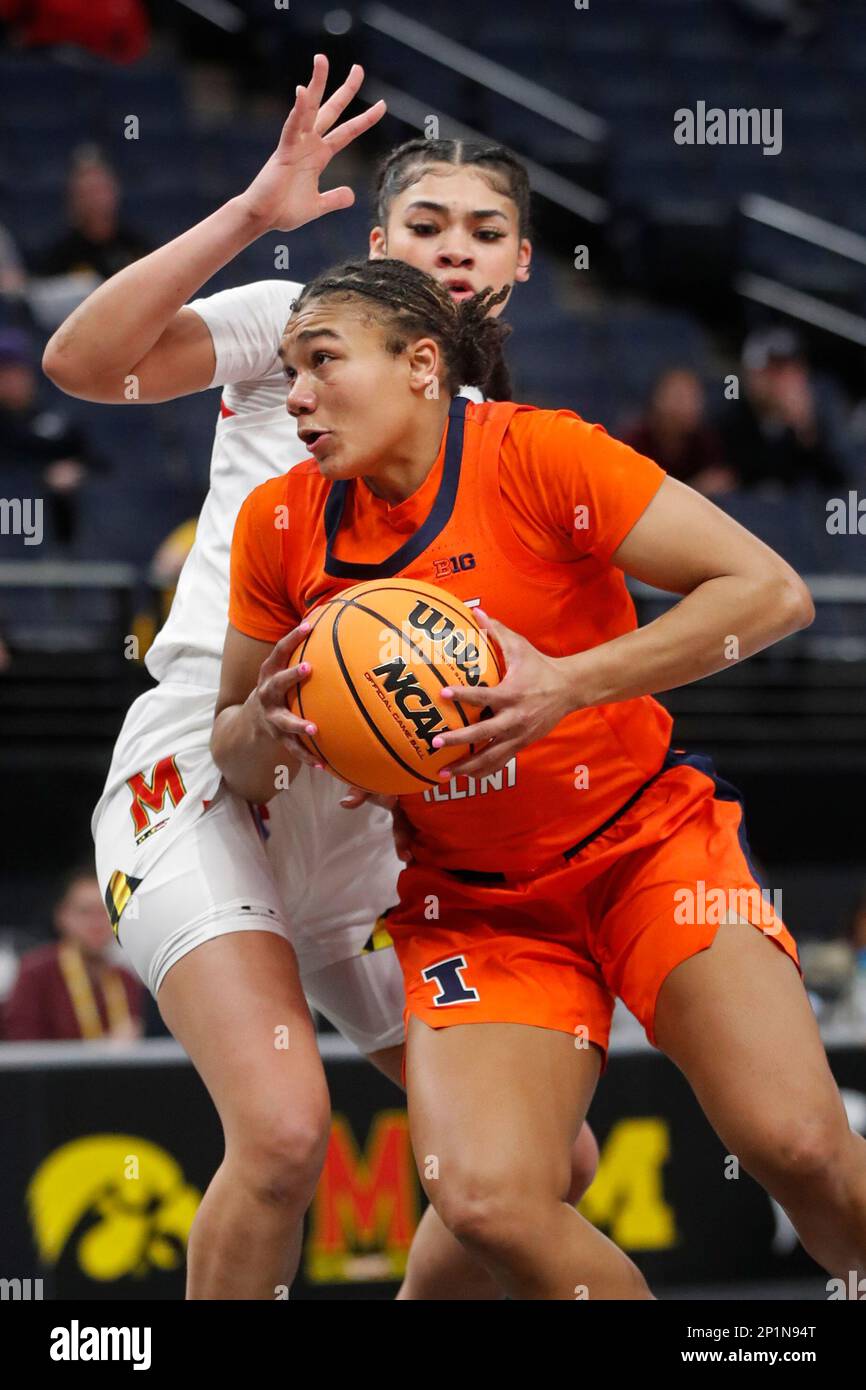 Illinois guard Adalia McKenzie, bottom, moves to the basket against ...