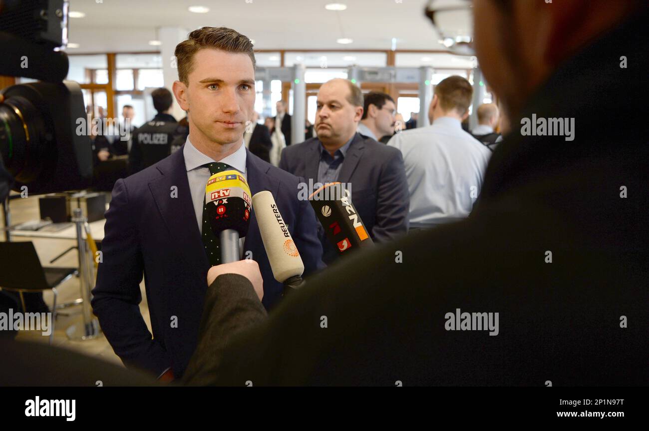 NPD party chairman Frank Franz is interviewed as he arrives at the ...