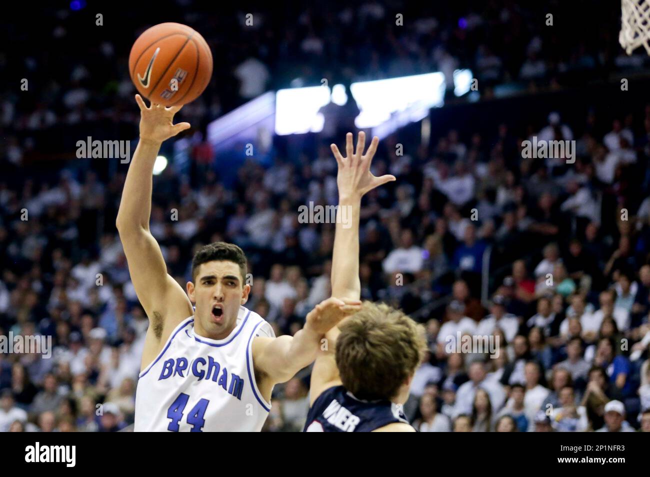 BYU center Corbin Kaufusi (44) goes to the hoop over Gonzaga forward ...