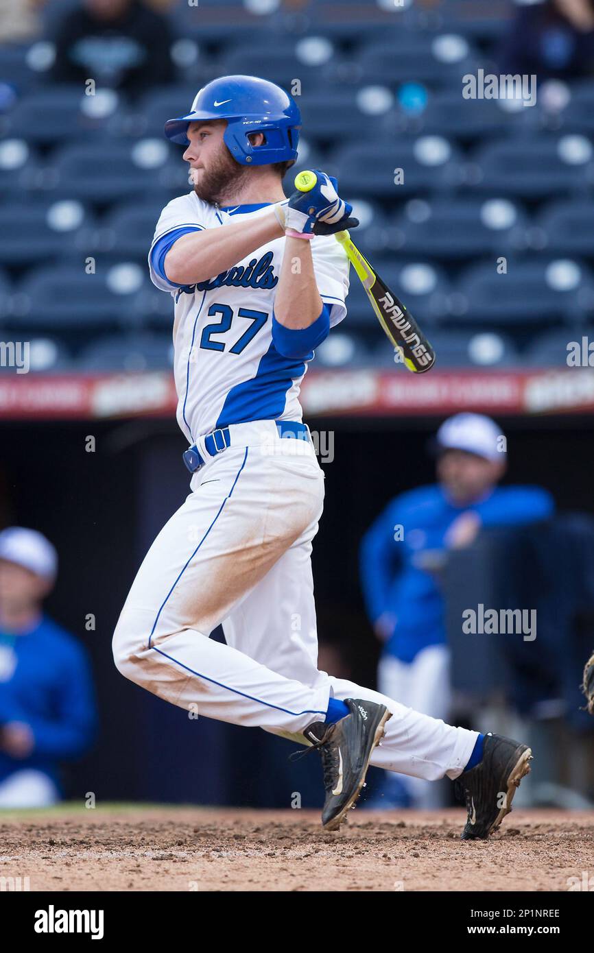 Evan Dougherty (27) of the Duke Blue Devils follows through on his ...