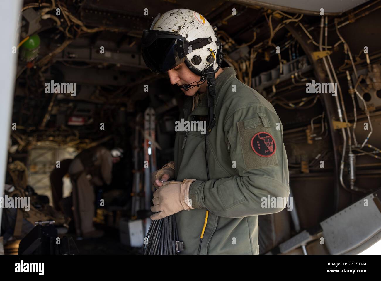 U.S. Marine Corps Cpl. Samuel Jones, an MV-22B Osprey crew chief with ...