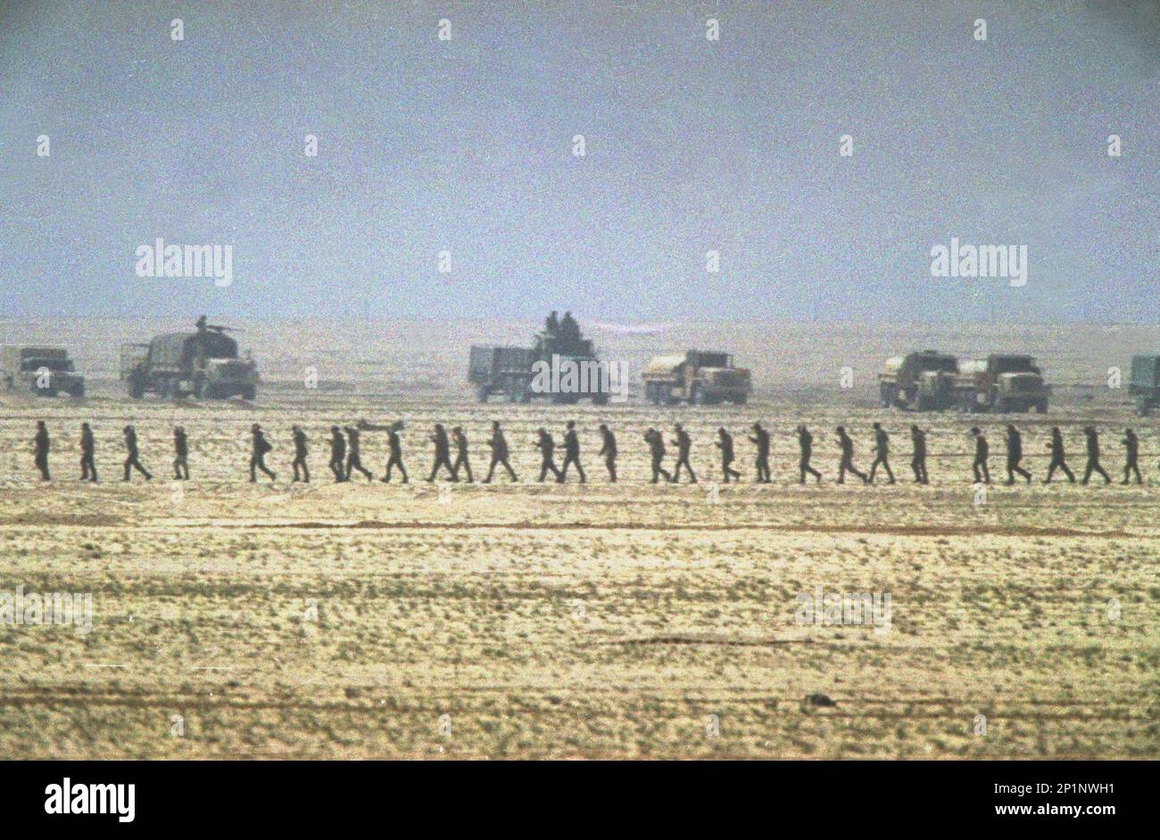 FILE - In this Sunday, February 24, 1991 file photo, a line of captured ...