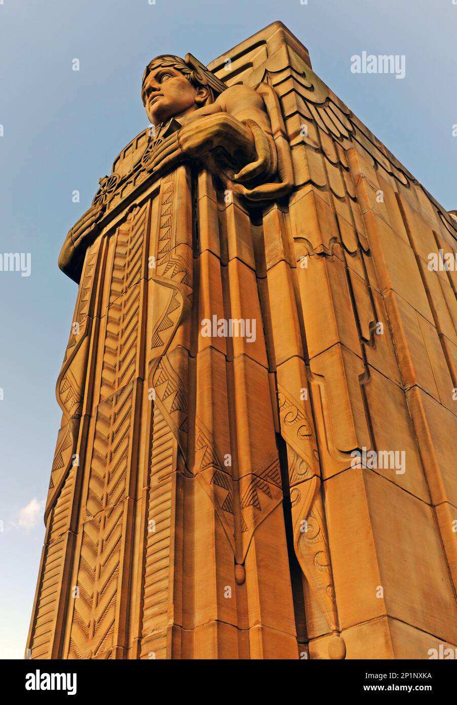 Imposing 43-foot high Guardian of Traffic holding a covered wagon is ...