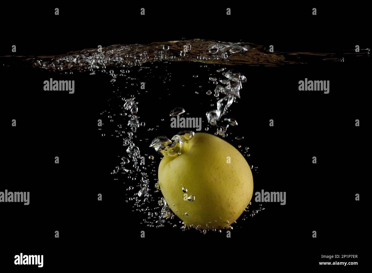 Apple water splash on black background showing water level Stock Photo ...