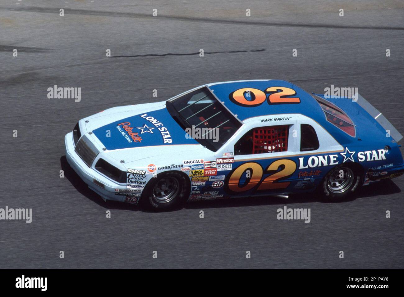 1986 February 13 | Thursday: Mark Martin (02) Ford Thunderbird races in ...