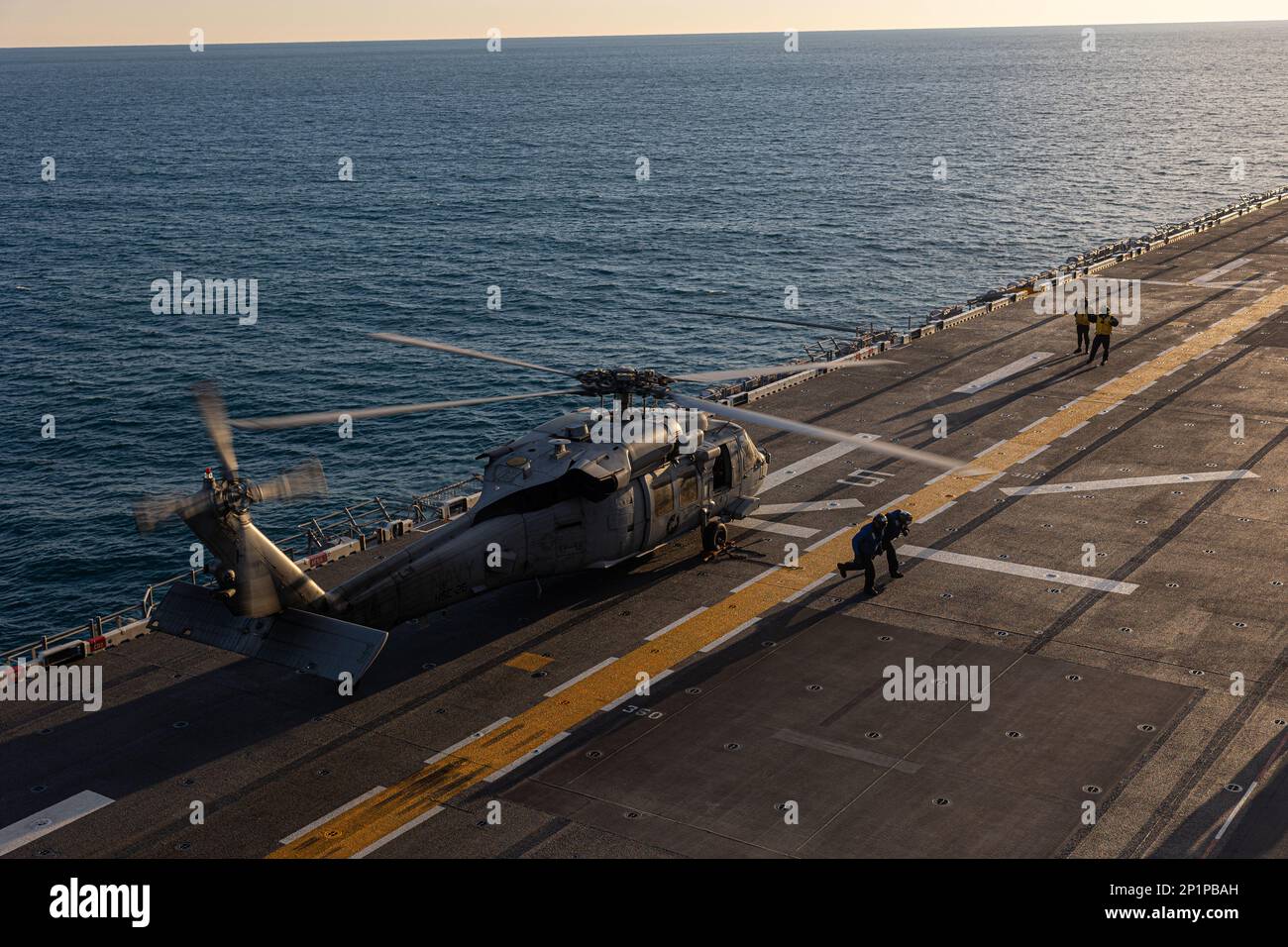 A U.S. Navy MH-60S Seahawk assigned to Helicopter Sea Combat Squadron ...