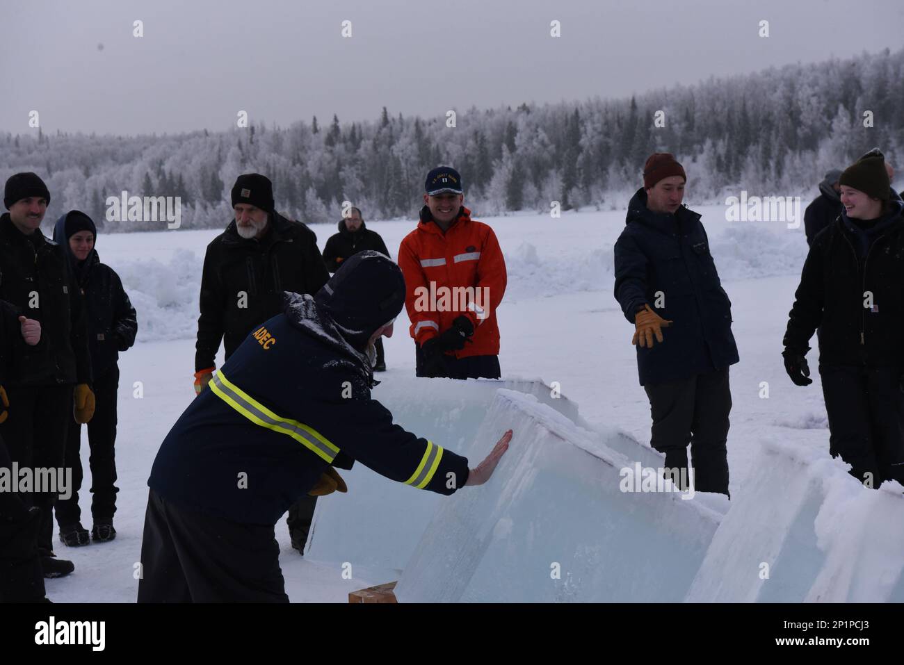 Members of the Coast Guard, Alaska Department of Environmental ...