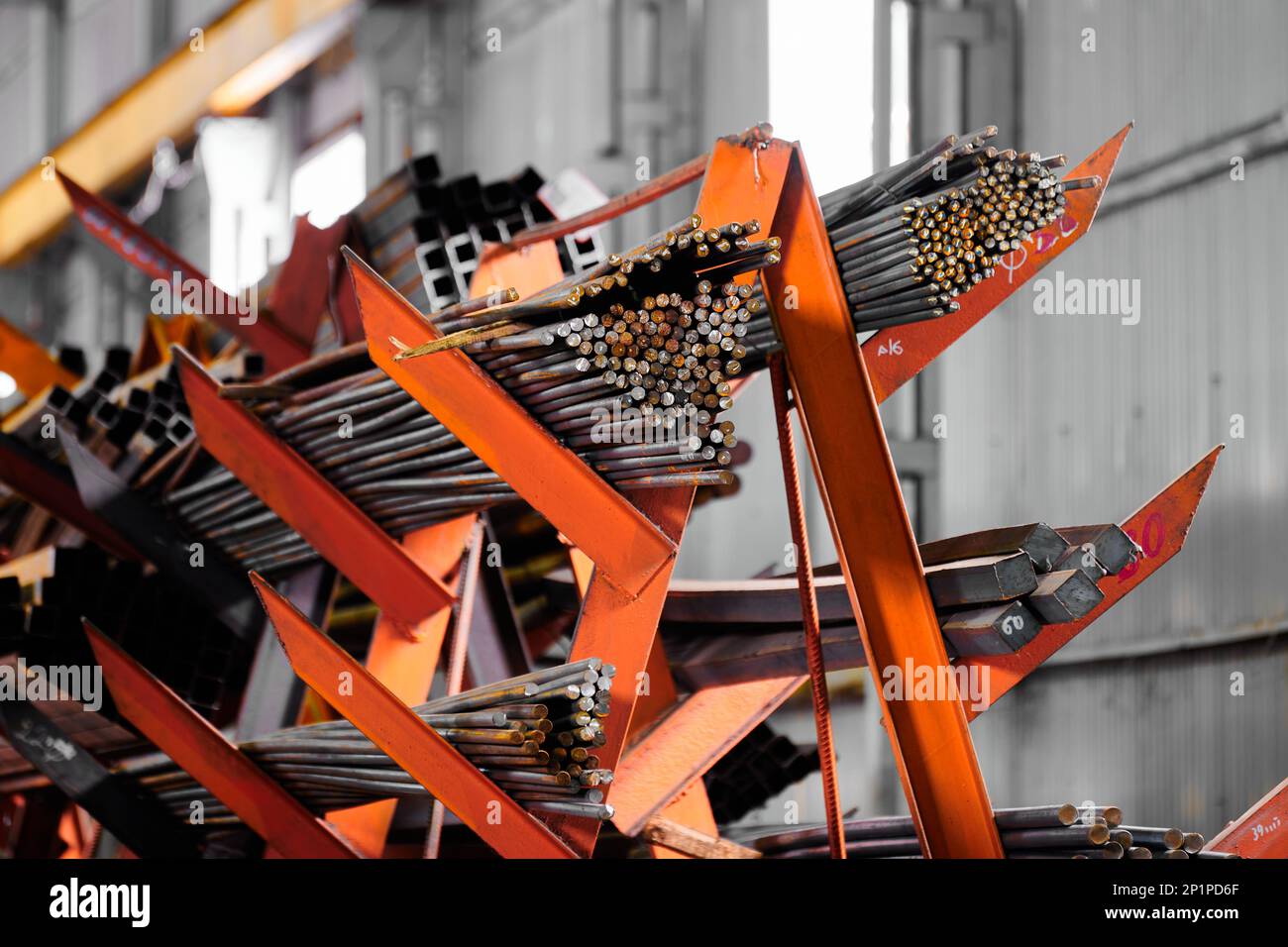 Rolled metal products on large racks in plant cold warehouse Stock ...