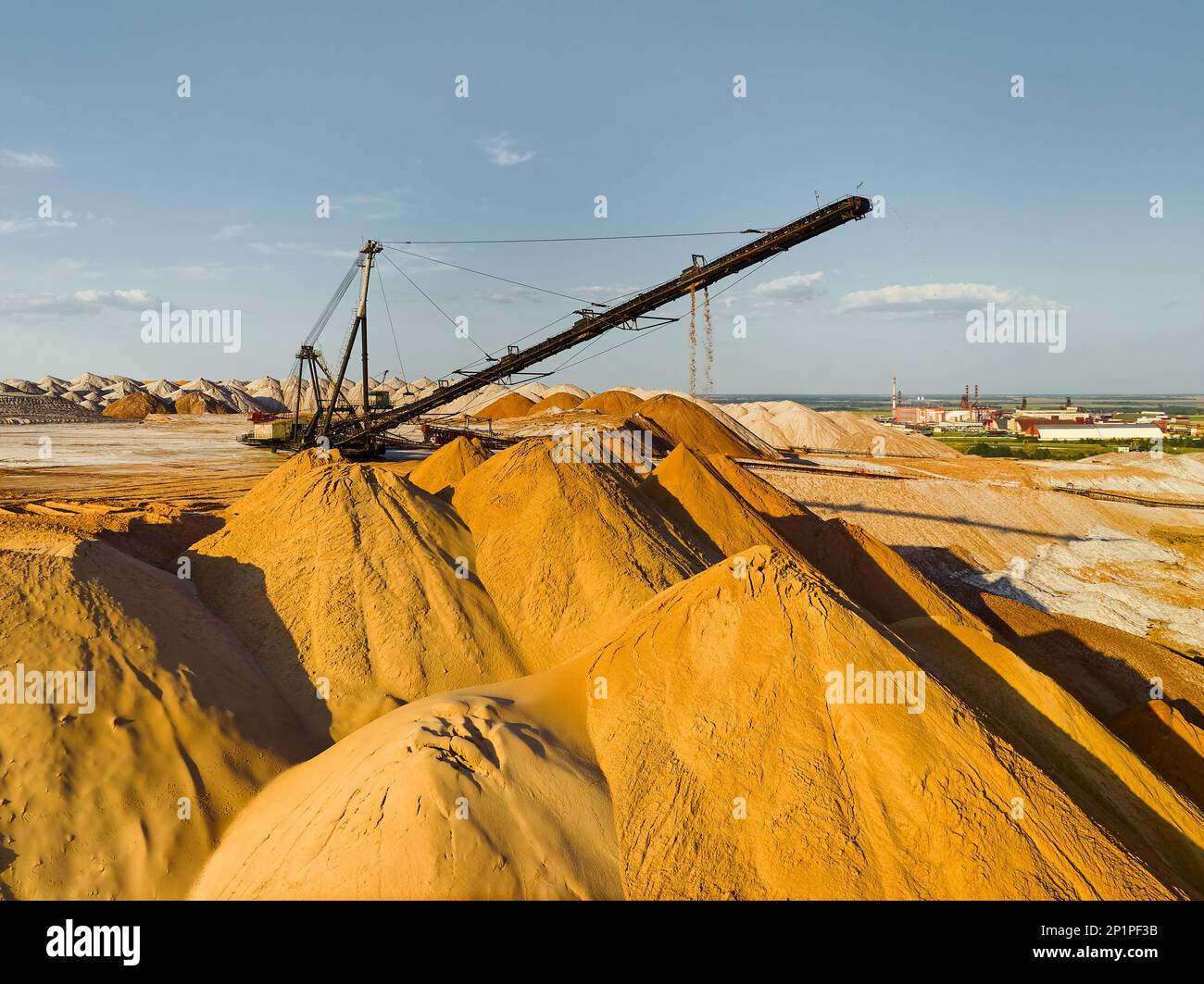 Movable spreader with high technology for transporting sand Stock Photo ...