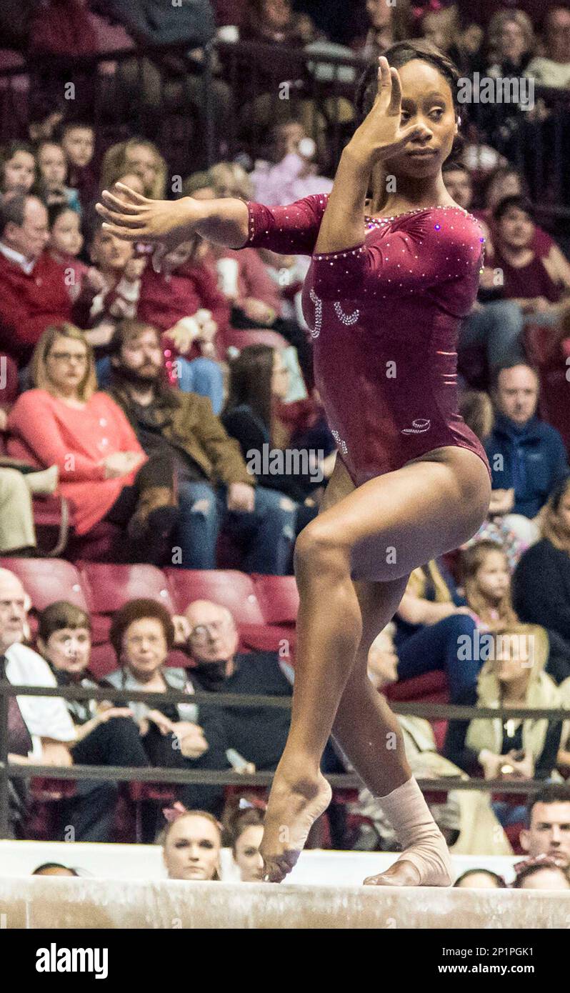 Alabama’s Aja Sims scores a 9.95 on the beam during an NCAA gymnastics ...