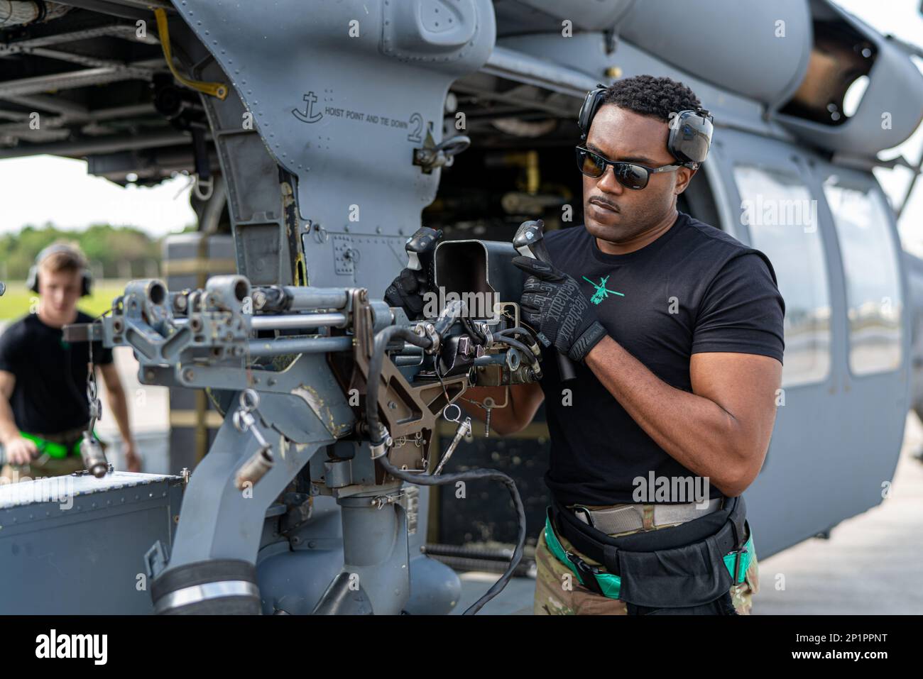U.S. Air Force Staff Sgt. Matthew Banks, 33rd Helicopter Maintenance Unit weapons specialist ...