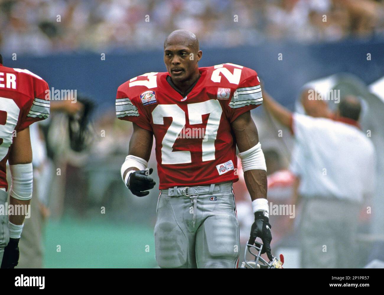 Ohio State University running back Eddie George (27) sets for play in ...