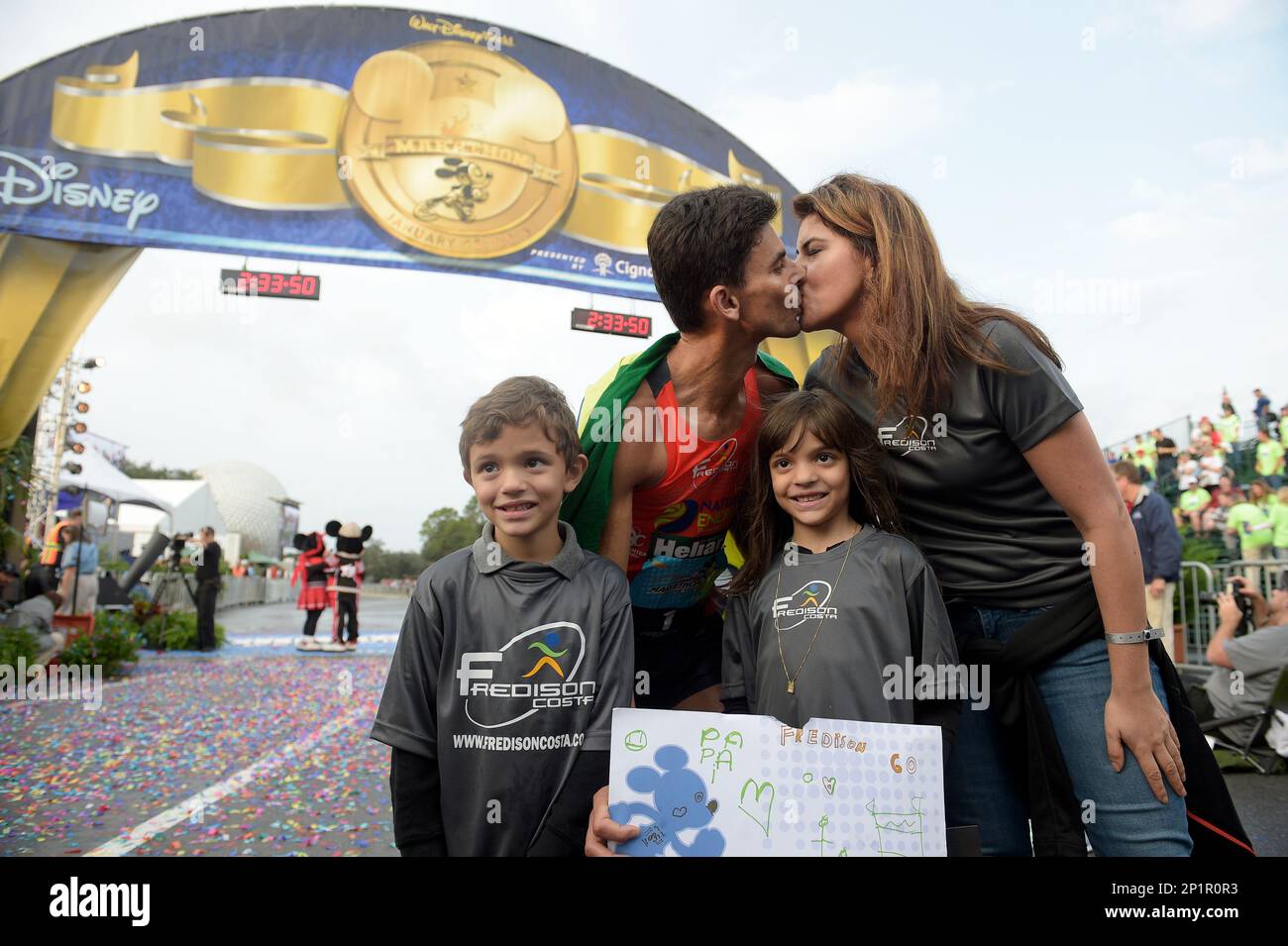Fredison Costa, of Brazil, kisses his girlfriend, Yanneth Montano ...