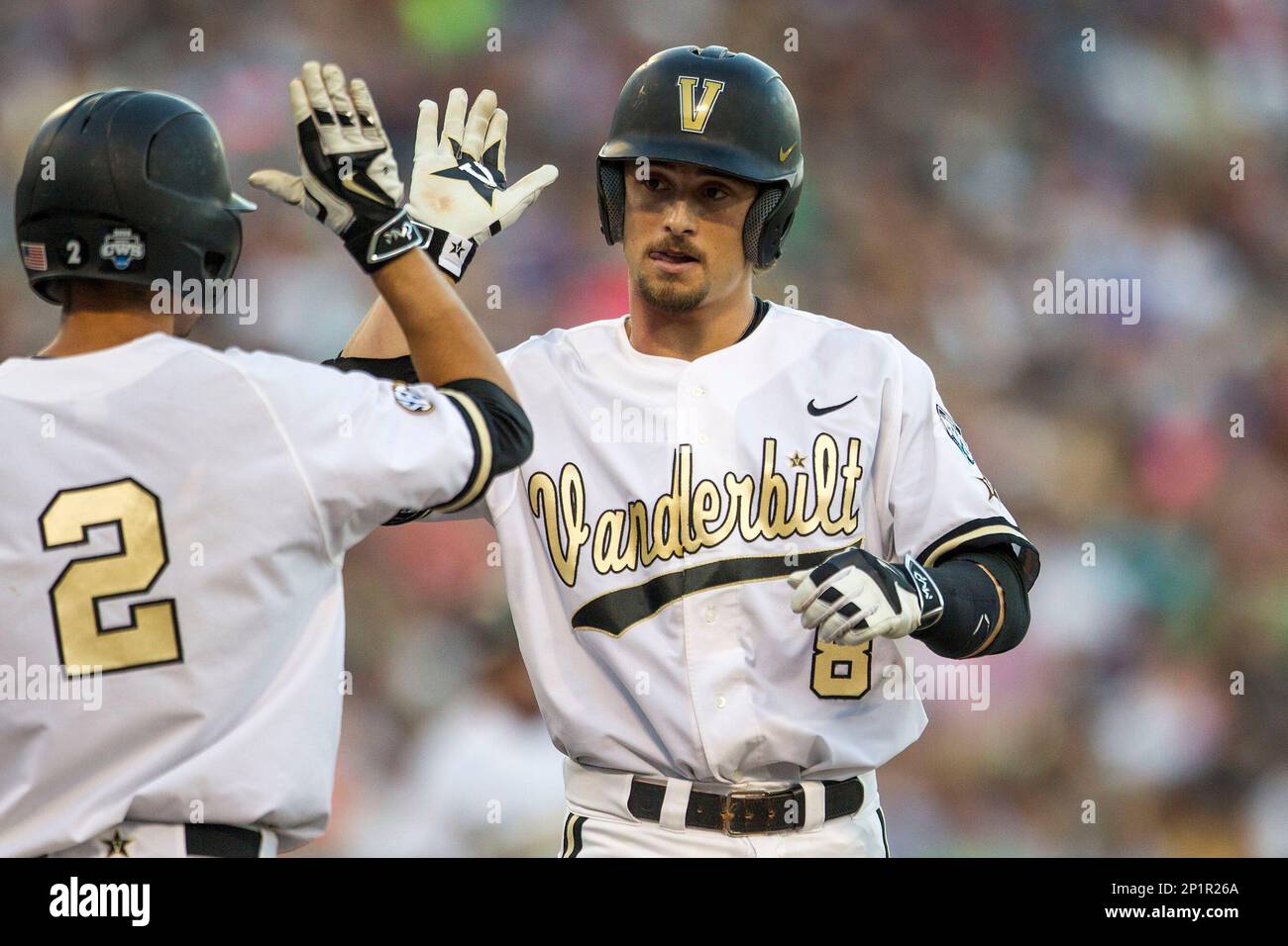 Vanderbilt Commodores outfielder Rhett Wiseman (8) crosses the plate ...