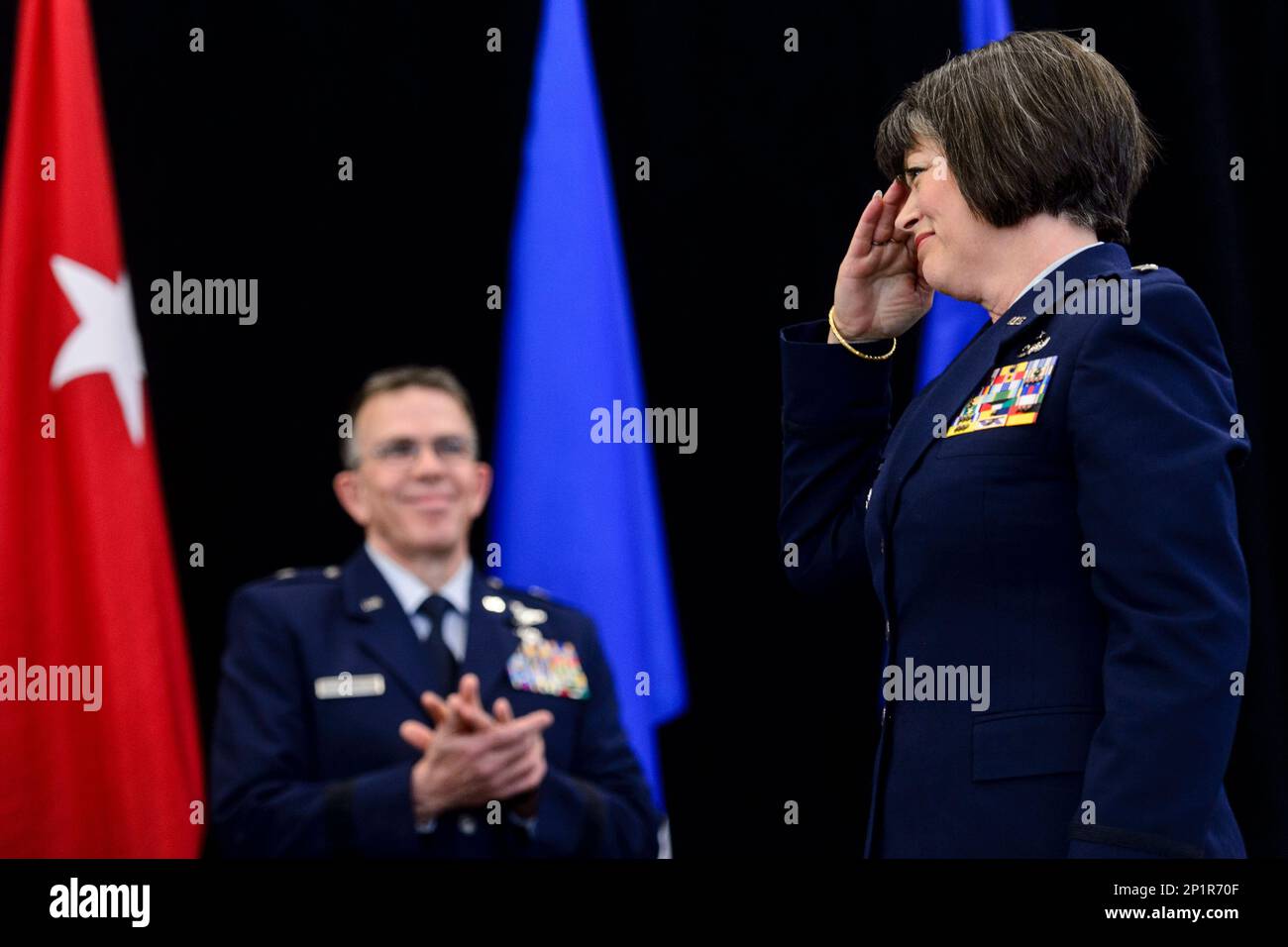 Colonel Paige P. Hunter salutes Major General James A. Hoyer (not ...
