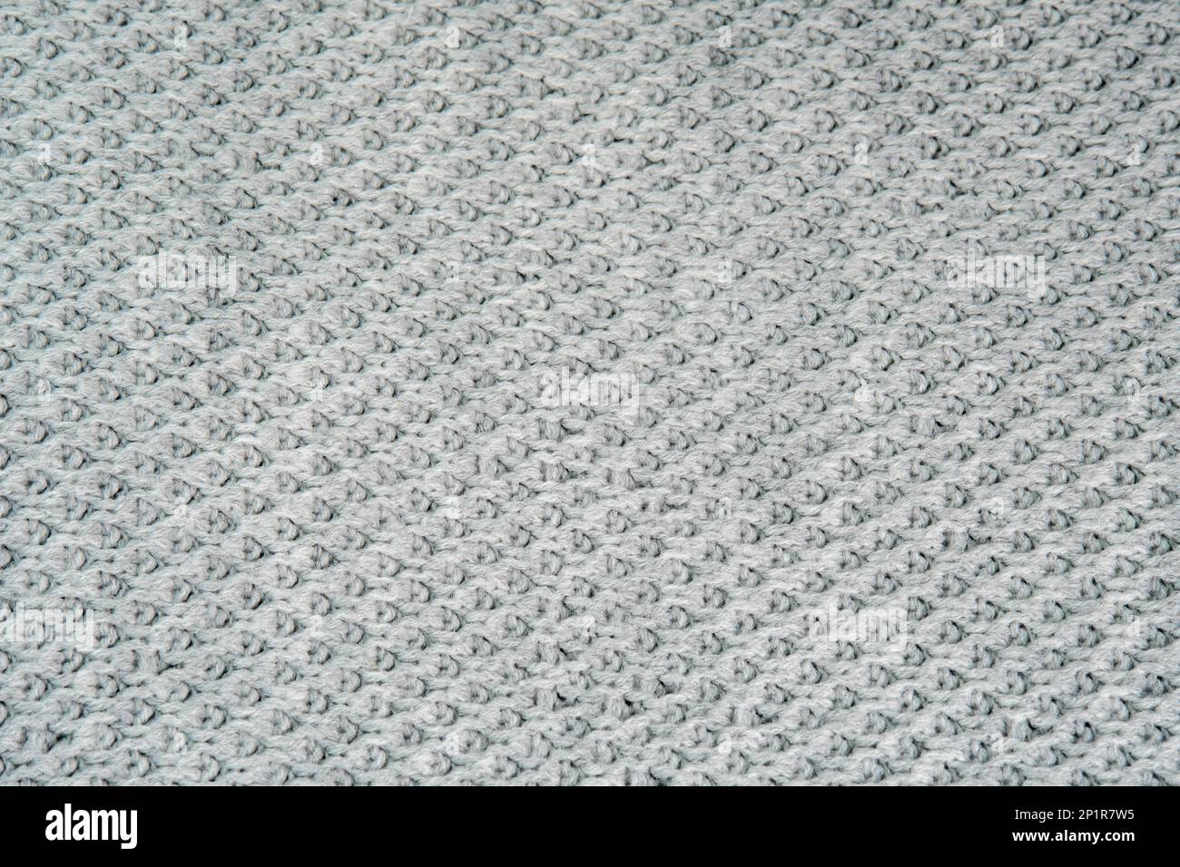 Knitted warm white fabric or sweater. Cozy textile background in the ...