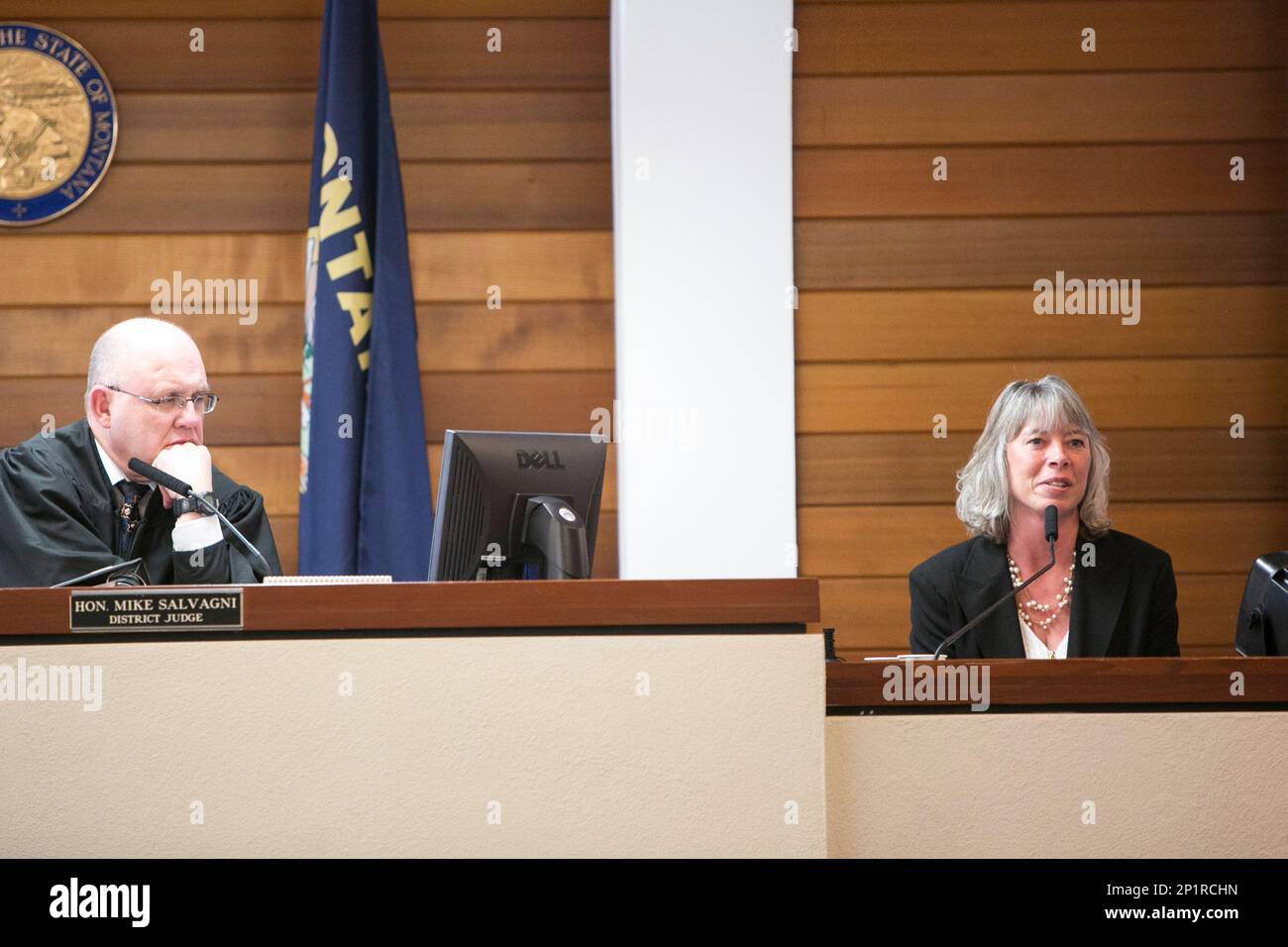 Kerrie Evans of Gardiner, Mont., right, testifies in District Judge ...