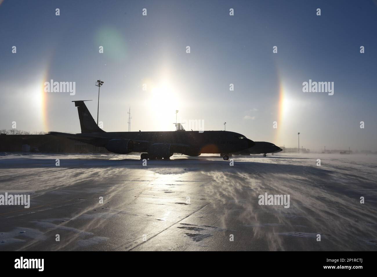 A north wind whips up snow on an icy ramp in Sioux City, Iowa as the ...