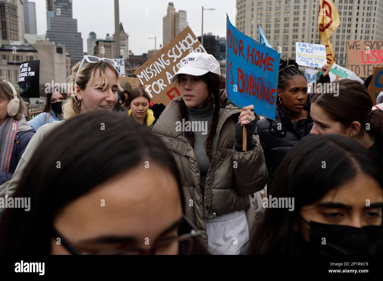 New York City, USA. 03rd Mar, 2023. People march with signs chanting ...