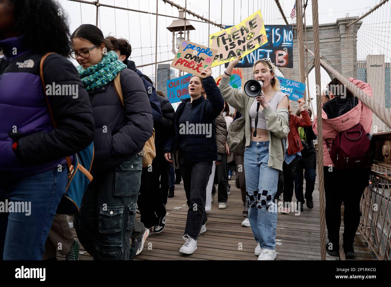 New York City, USA. 03rd Mar, 2023. People march with signs chanting ...