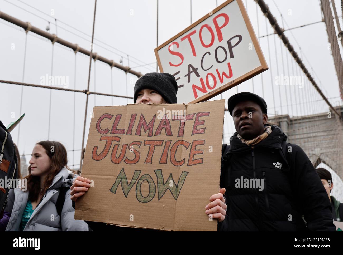 New York City, USA. 03rd Mar, 2023. People march with signs chanting ...