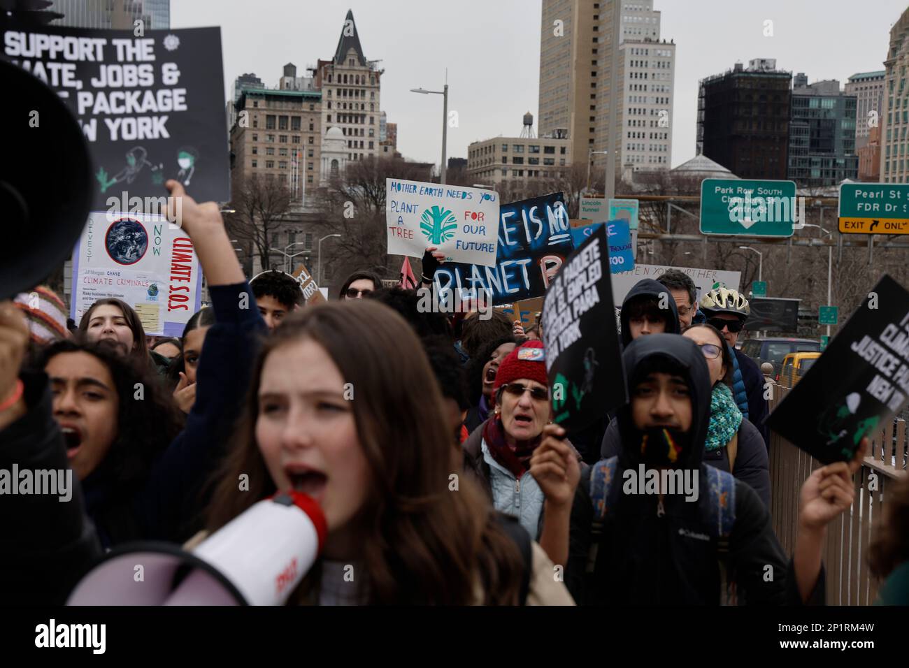 New York City, USA. 03rd Mar, 2023. People march with signs chanting ...