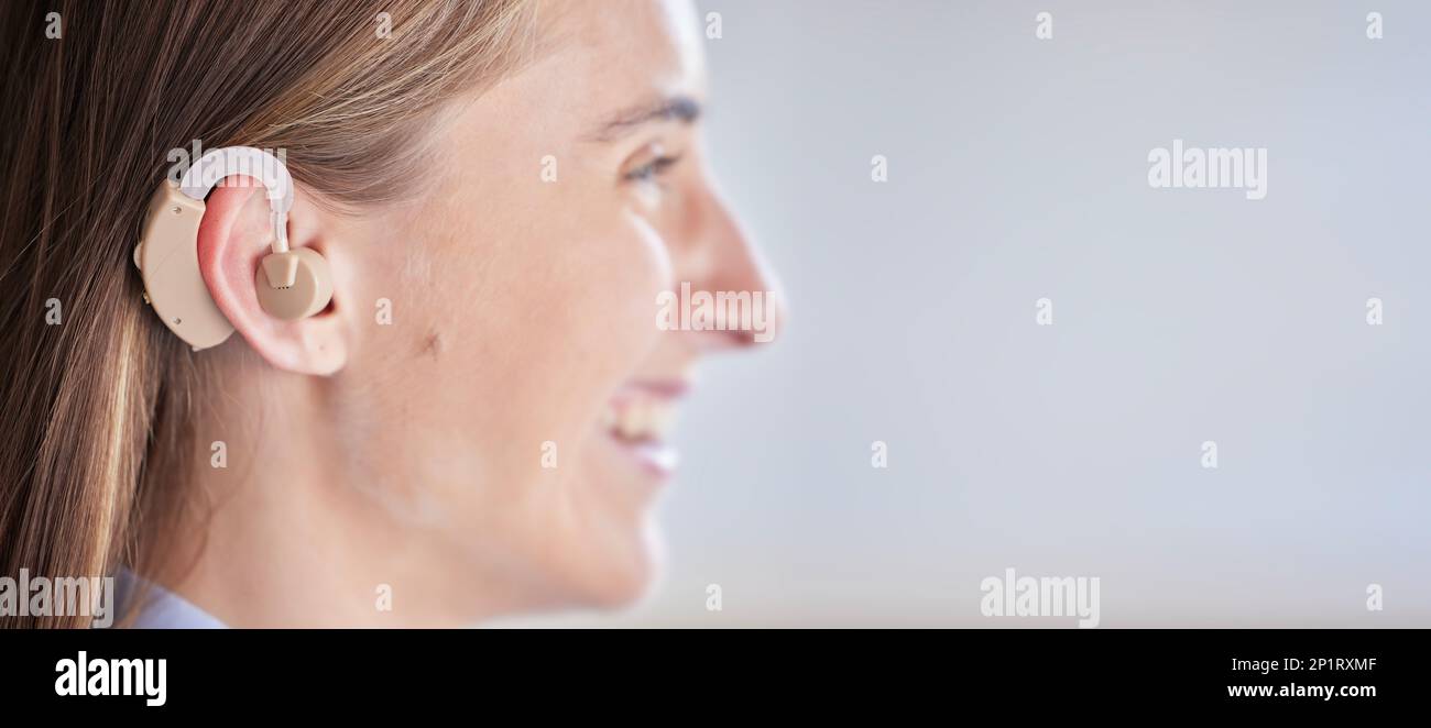 Mockup, deaf and woman with ear piece, disability and health against a ...