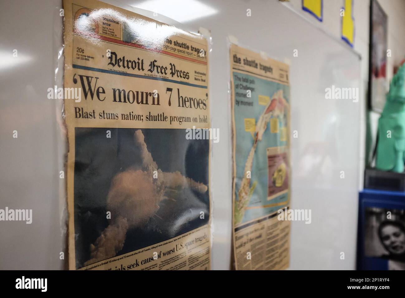 Newspapers from 30 years ago documenting the Challenger explosion hang ...