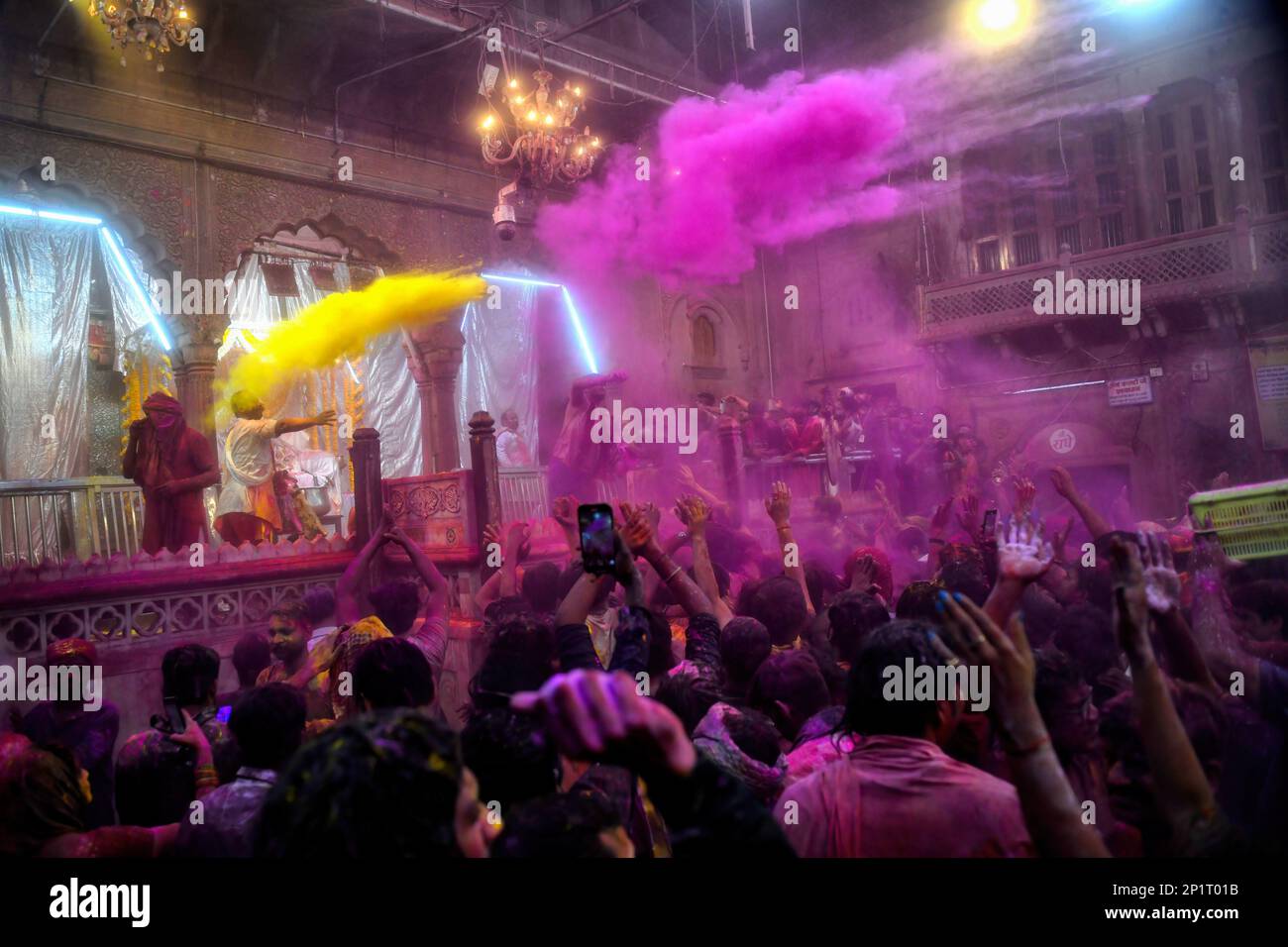 Vrindavan, India. 03rd Mar, 2023. Hindu devotees are seen throwing ...
