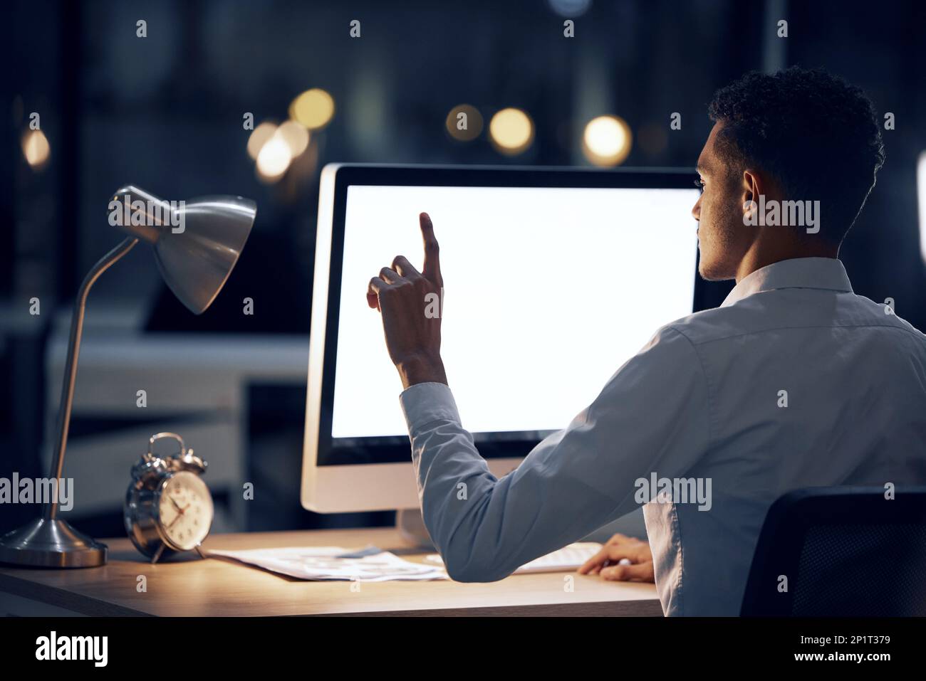 Computer mock up, night and man point at crypto finance database, bitcoin mining dashboard or ...