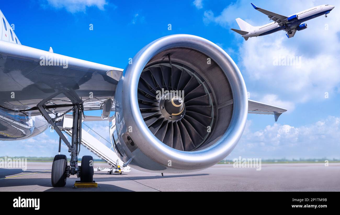 jet engine and a starting airplane in the back Stock Photo - Alamy