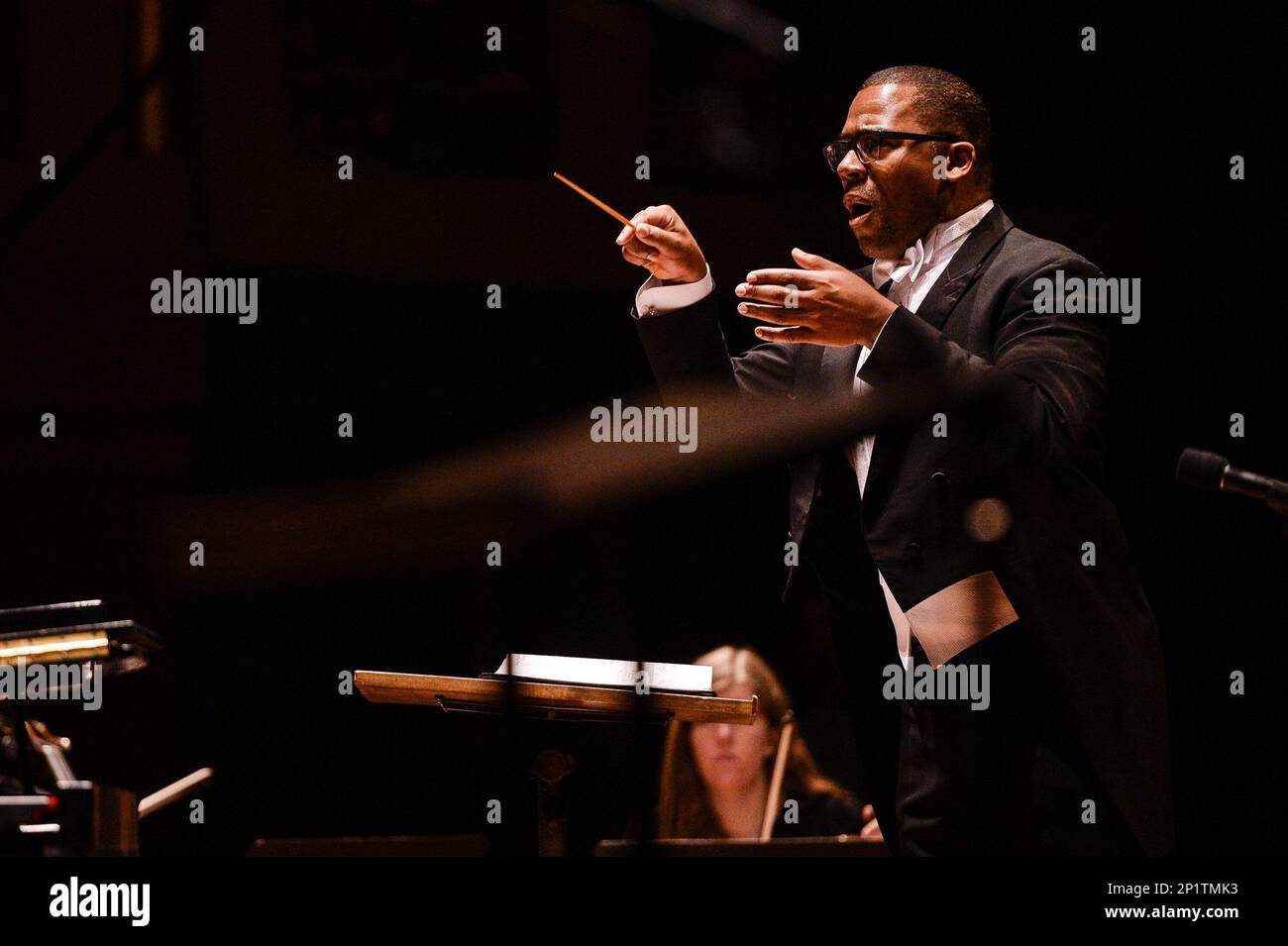 Eugene Rogers, conducts the University of Michigan Men's Glee Club at ...
