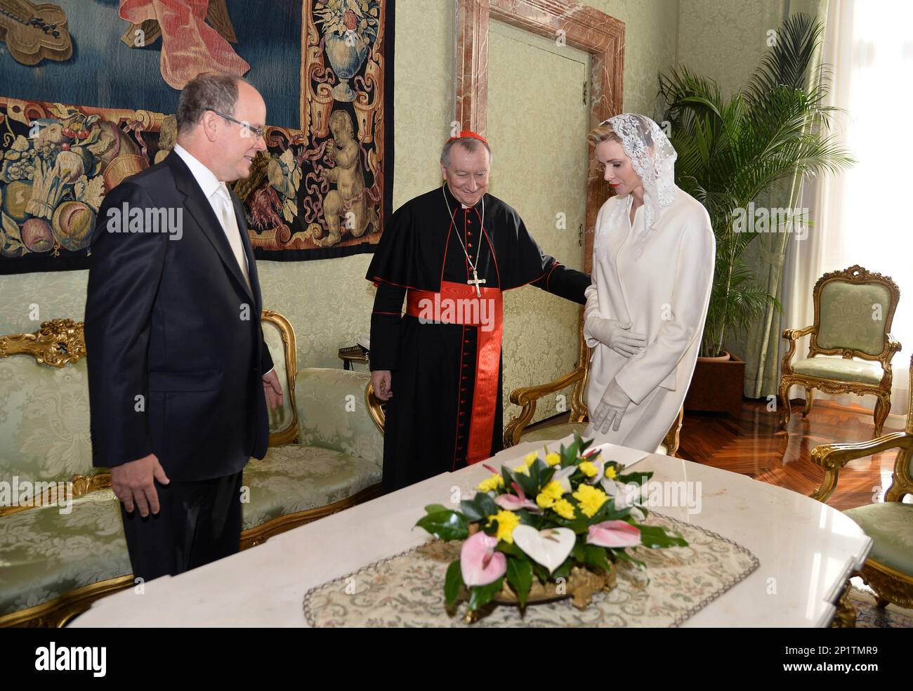 Vatican Secretary of State, Cardinal Pietro Parolin, center, meet with ...