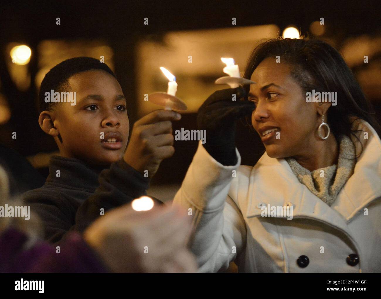 Karmisha Wallace, right, and her son Cameron Wallace, left, participate ...