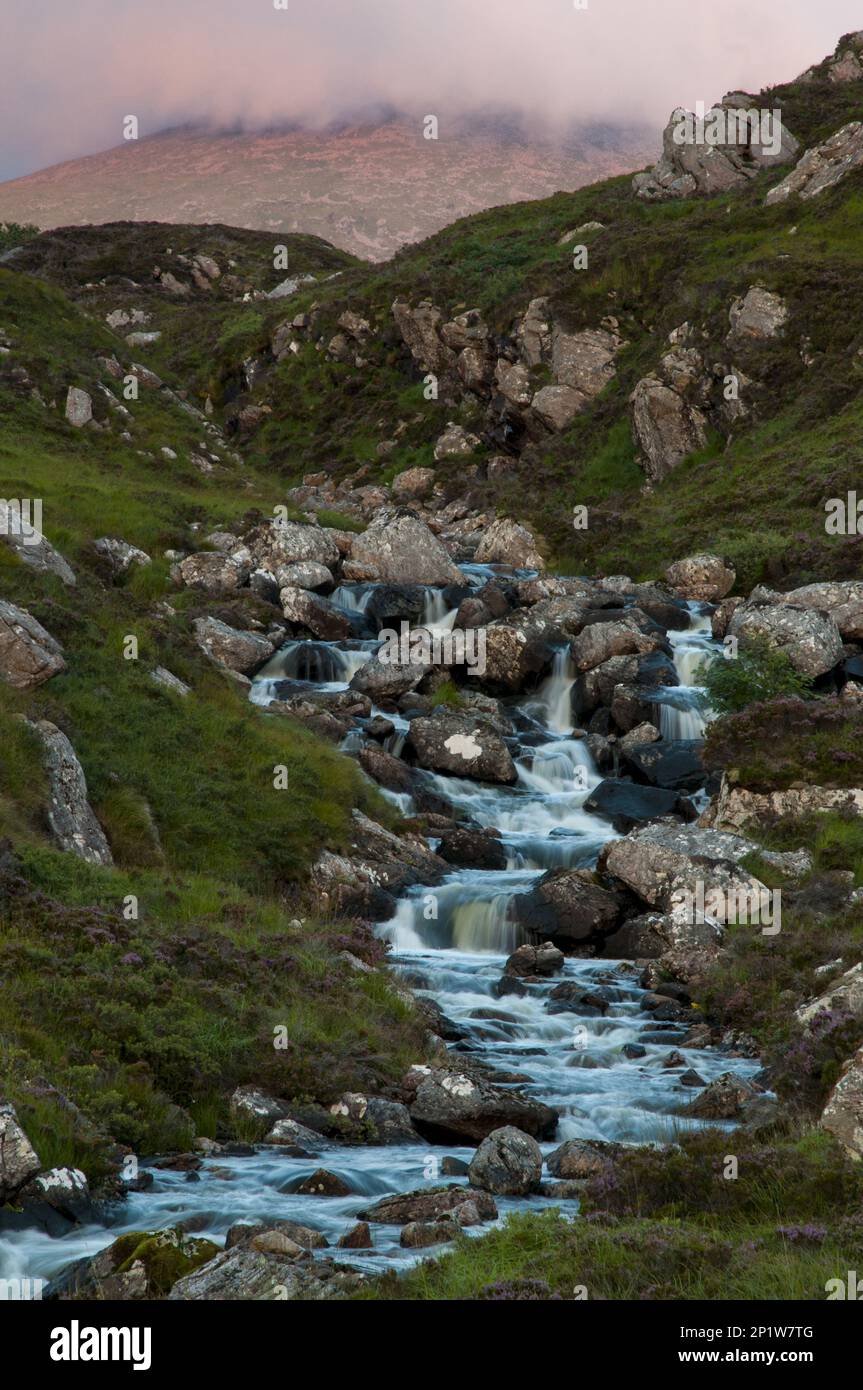 View of cascading upland river habitat at dusk, Easan Garbh Waterfalls ...