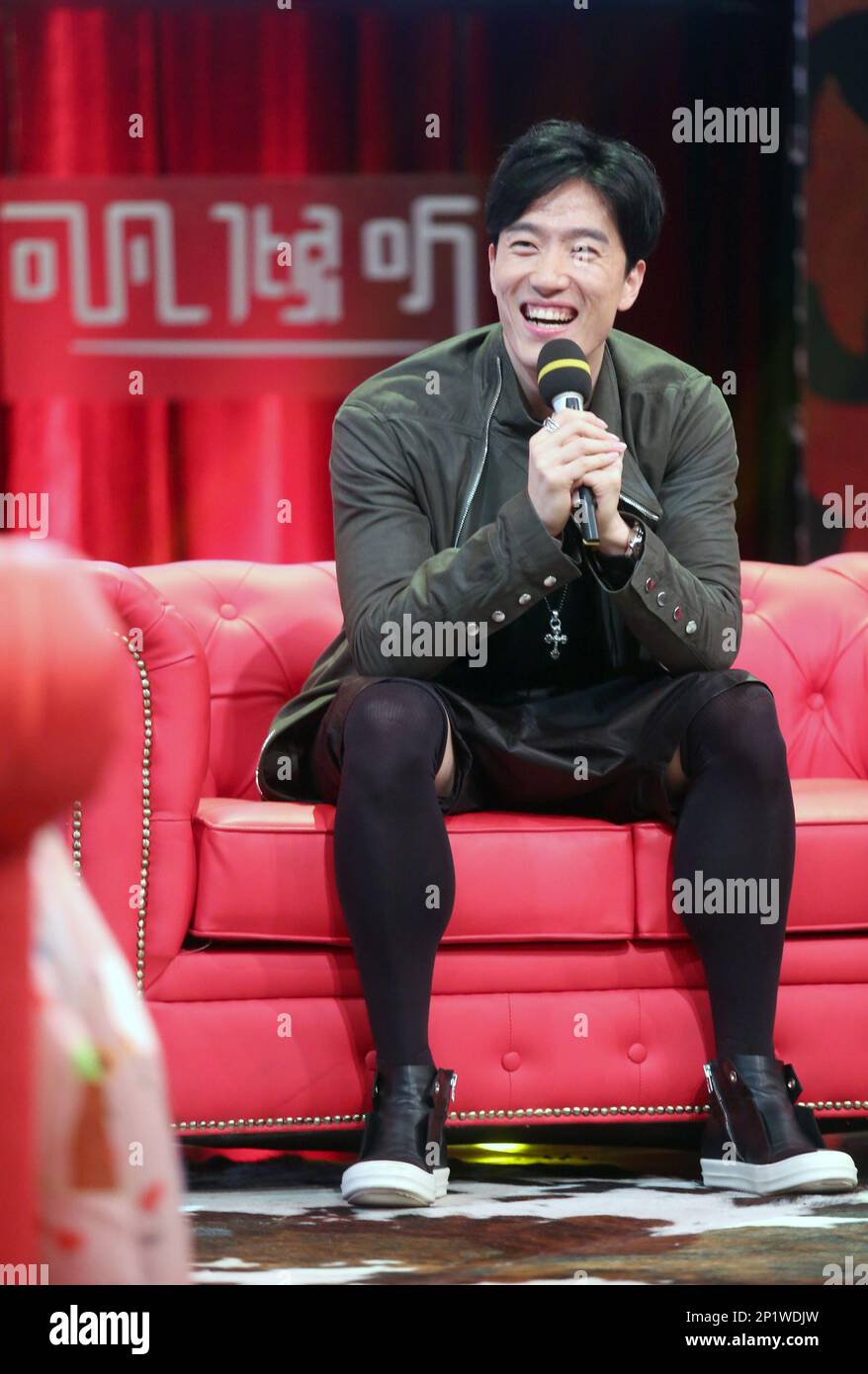 --FILE--Retired Chinese star hurdler Liu Xiang reacts during an episode ...