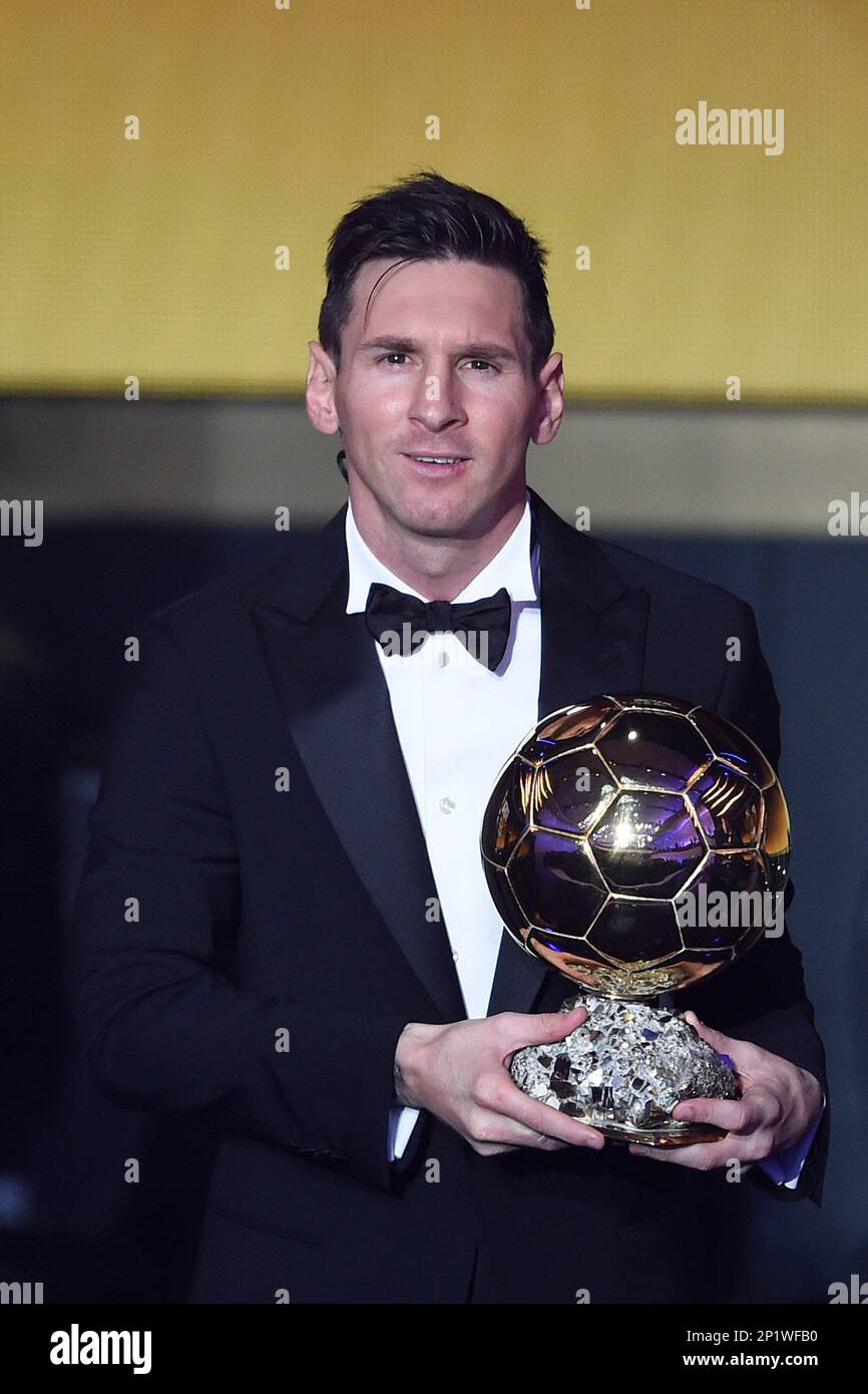 Argentina's Lionel Messi poses with the trophy after winning the FIFA ...