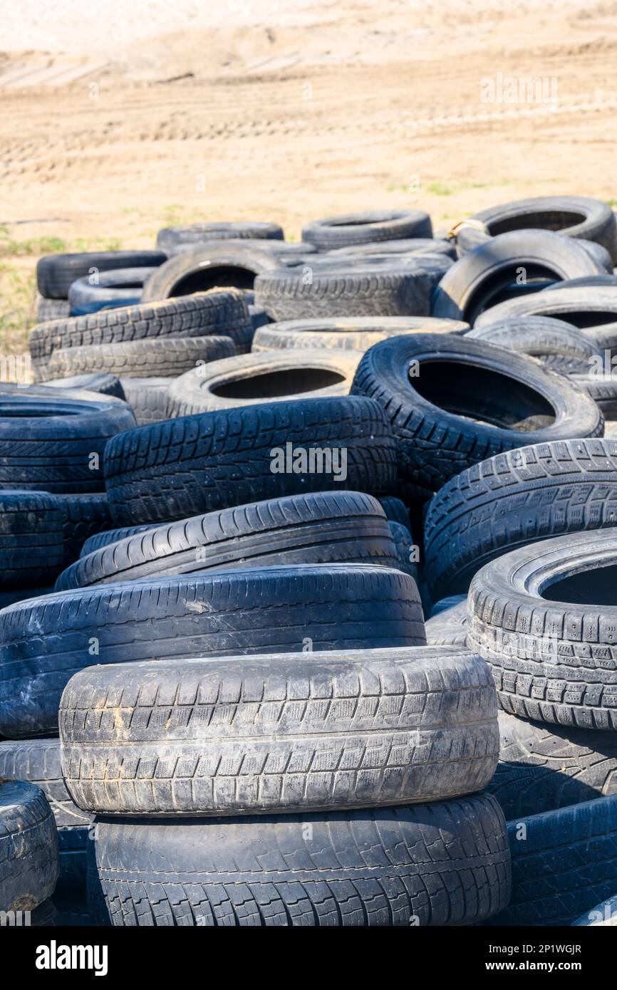 A bunch of old used worn out tires Stock Photo - Alamy
