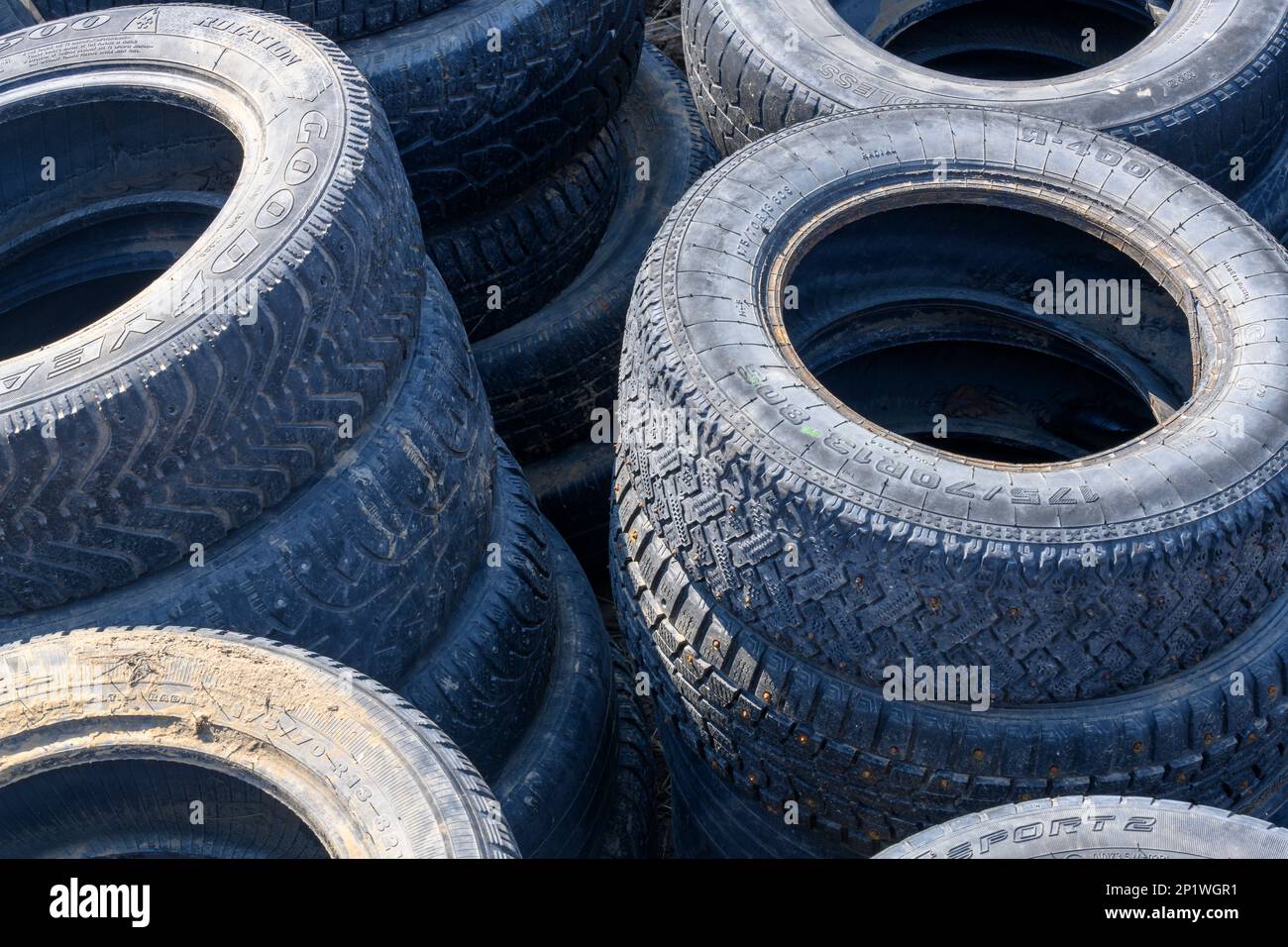 A bunch of old used worn out tires Stock Photo - Alamy