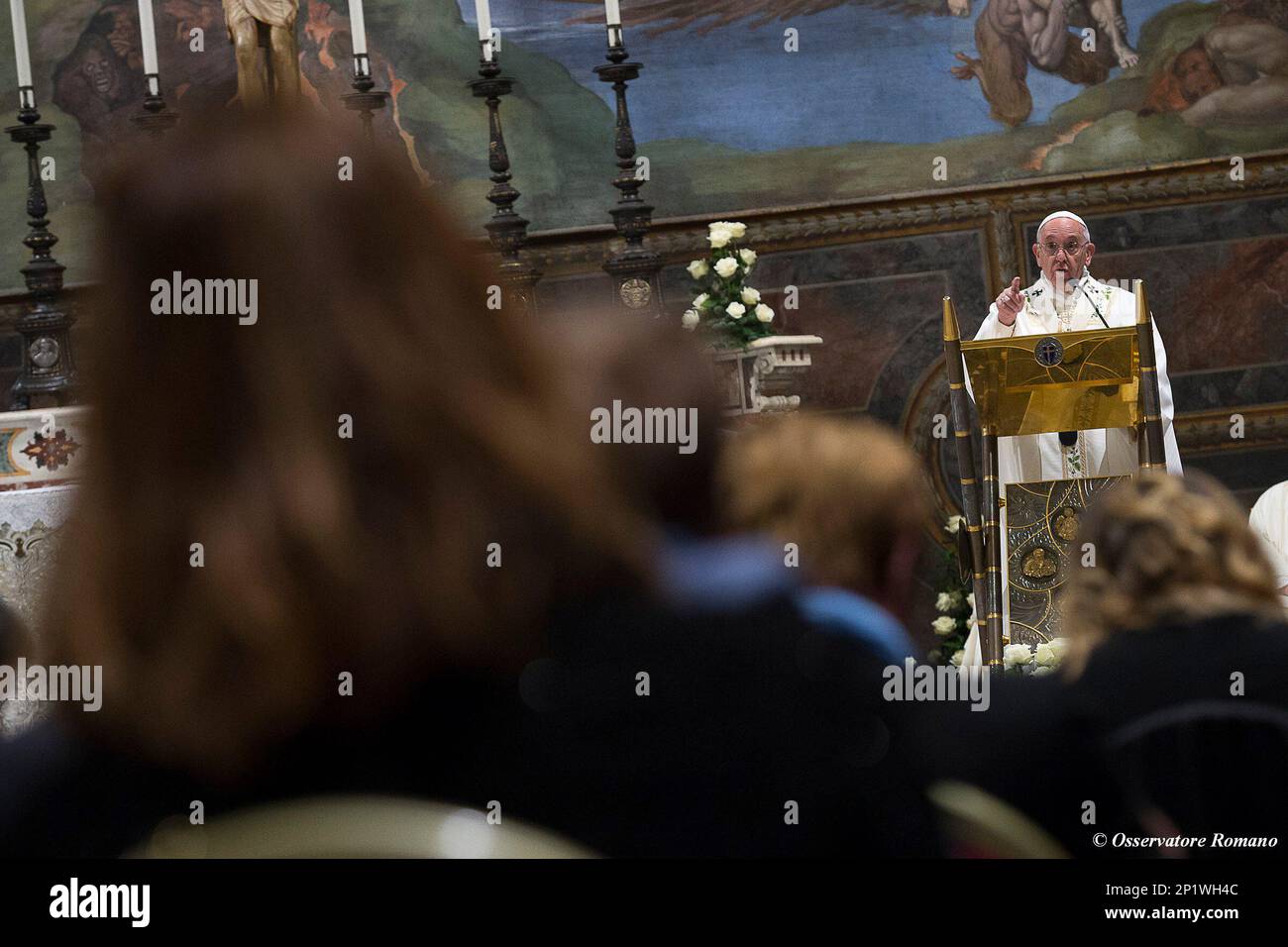 Pope Francis delivers his homily during the baptism ceremony of 26 ...