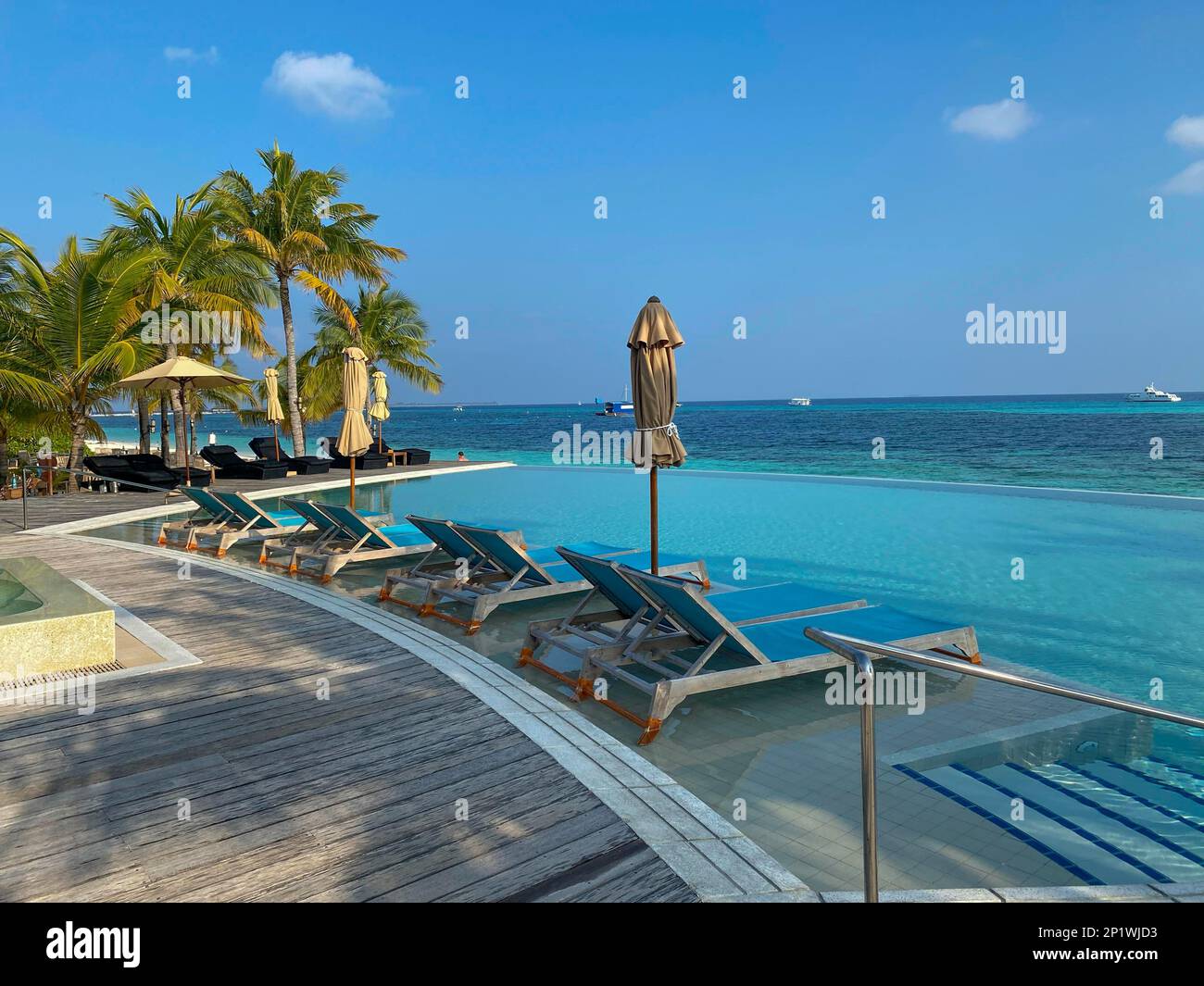 Holiday island in the Maldives, With swimming pool, Huts, and sun ...