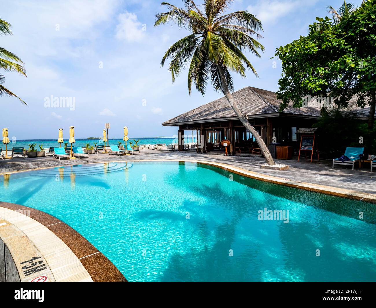 Holiday island in the Maldives, With swimming pool, Huts, and sun ...