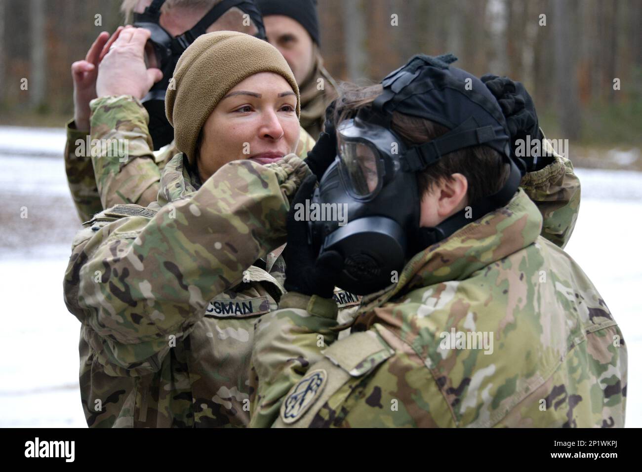 U.S. Army Cpt. Devan, Icsman, left, with 207th Military Intelligence ...